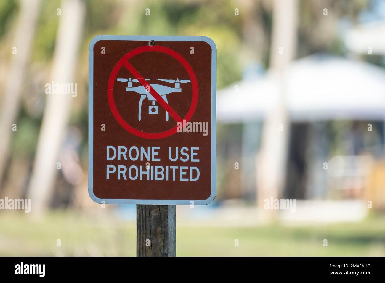 Signpost with warning about drone usage prohibition in state park ...
