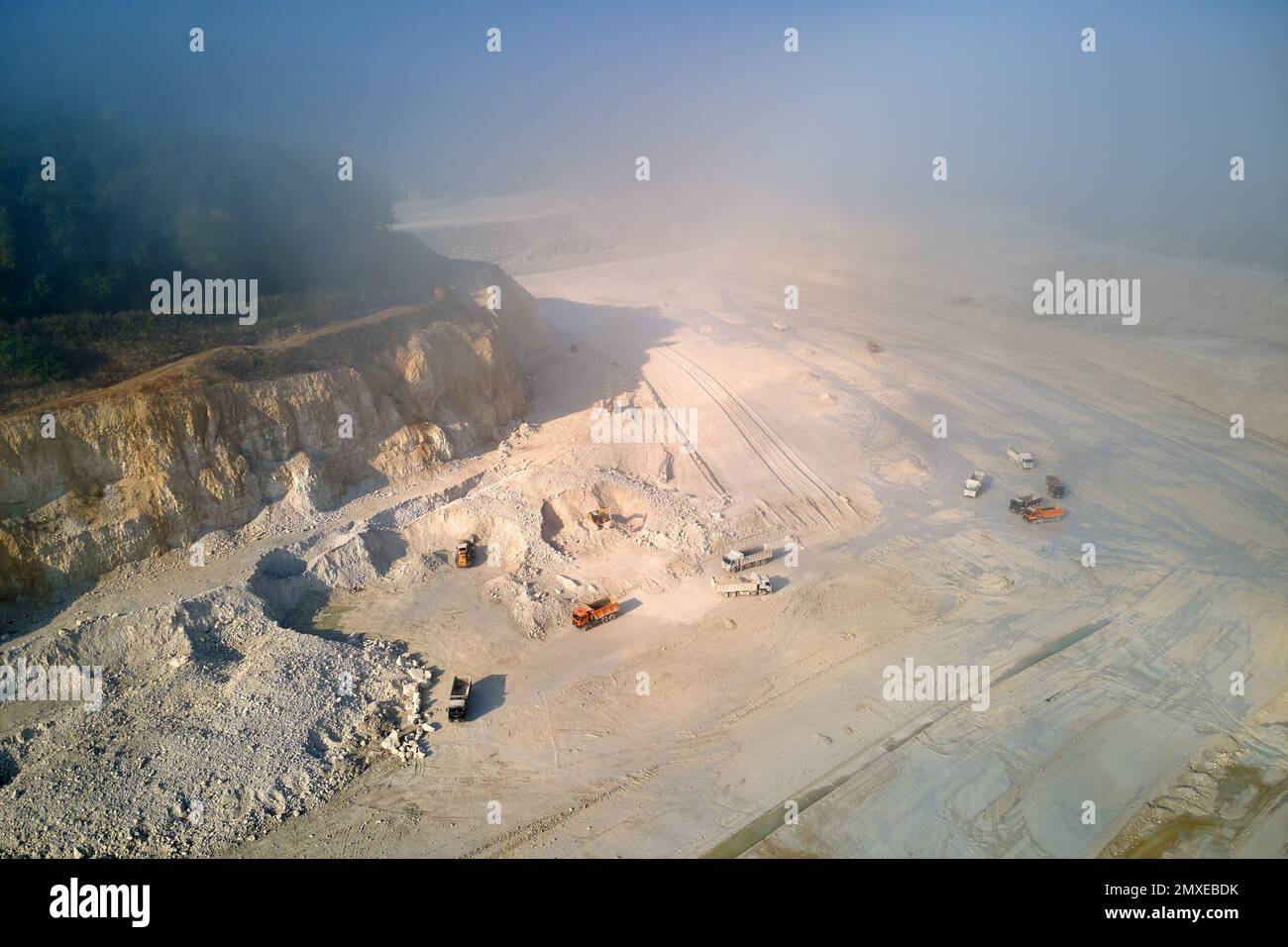 Aerial view of open pit mining site of limestone materials extraction ...