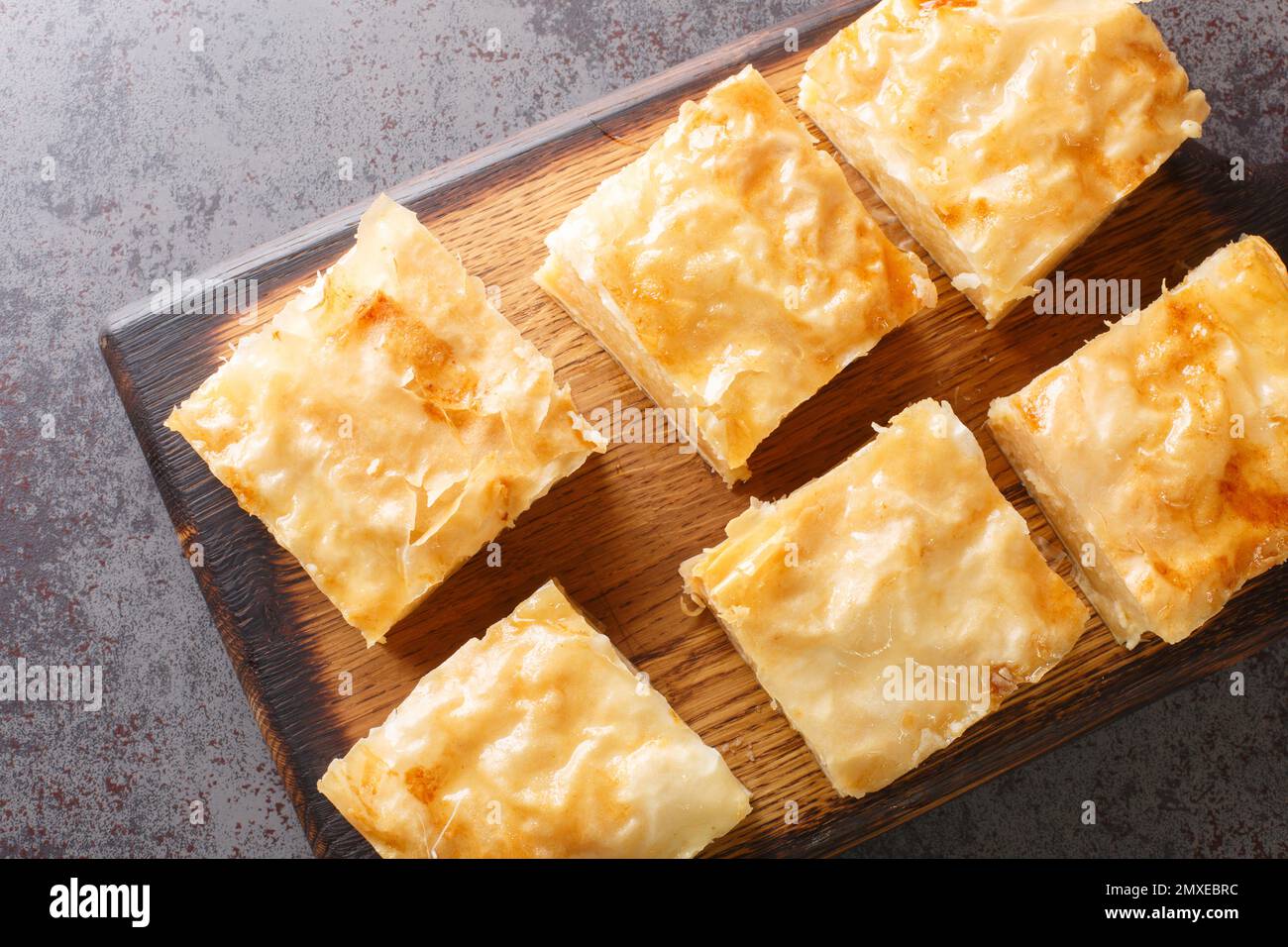 Greek custard pie Galaktoboureko with semolina cream closeup on the ...