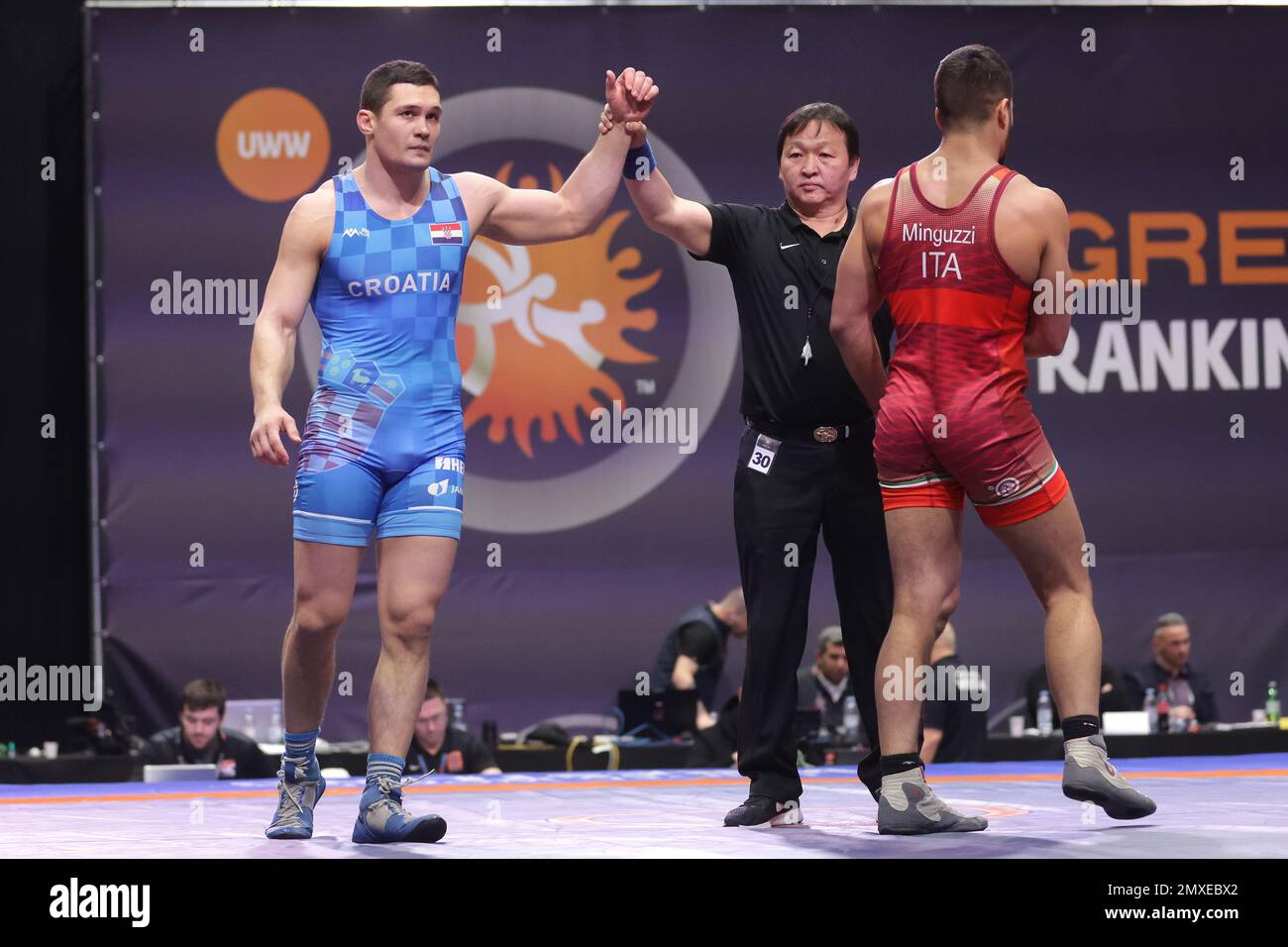 ZAGREB, CROATIA – FEBRUARY 03: Mirco Minguzzi of Italy (red) competes ...