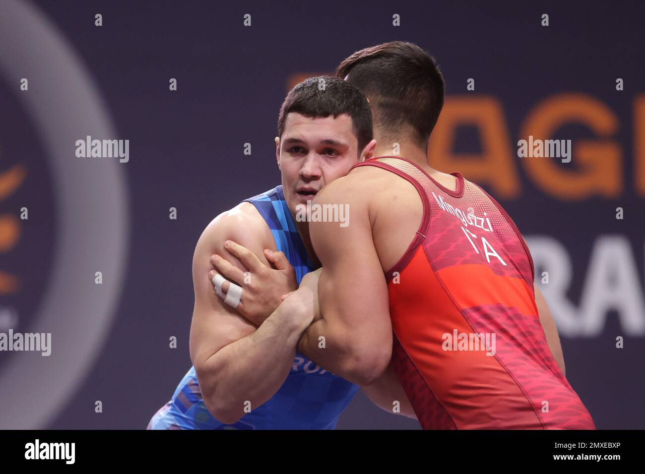ZAGREB, CROATIA – FEBRUARY 03: Mirco Minguzzi of Italy (red) competes ...