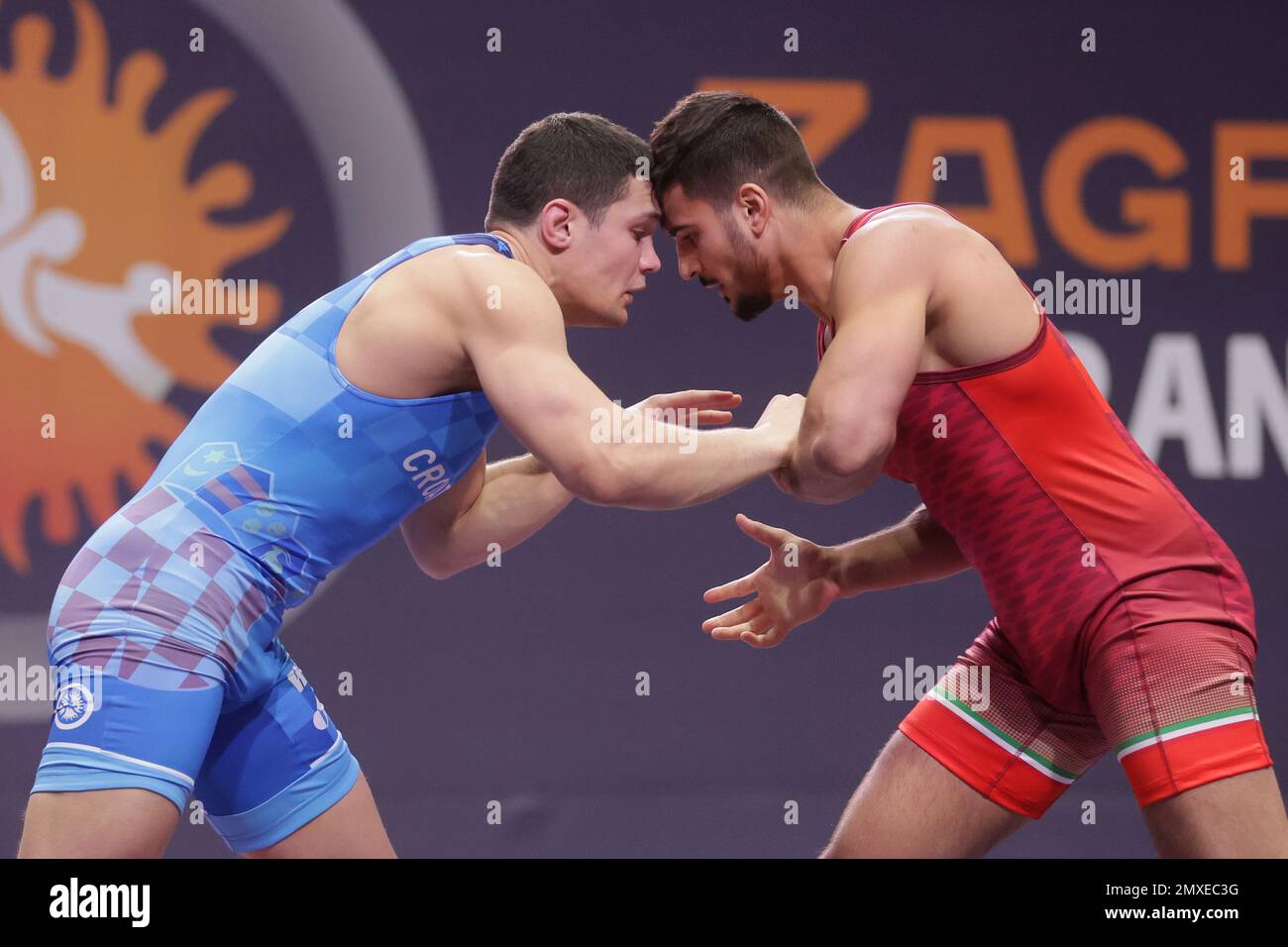ZAGREB, CROATIA – FEBRUARY 03: Mirco Minguzzi of Italy (red) competes ...