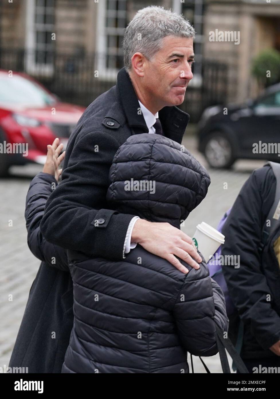 Detective chief inspector Graham Smith greets greets Bennylyn Burke's ...