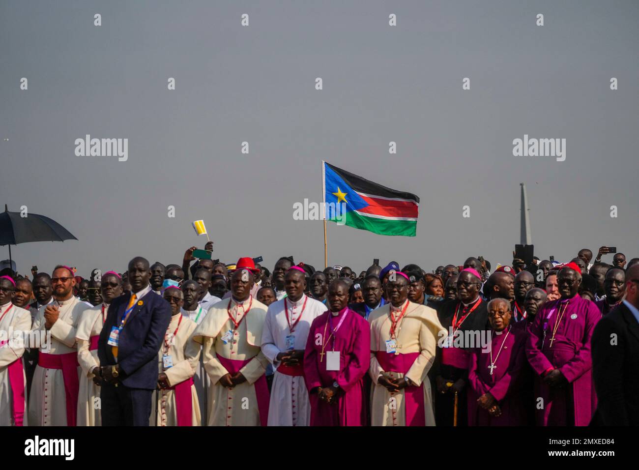People wait for the arrival of Pope Francis at Juba's airport, South ...