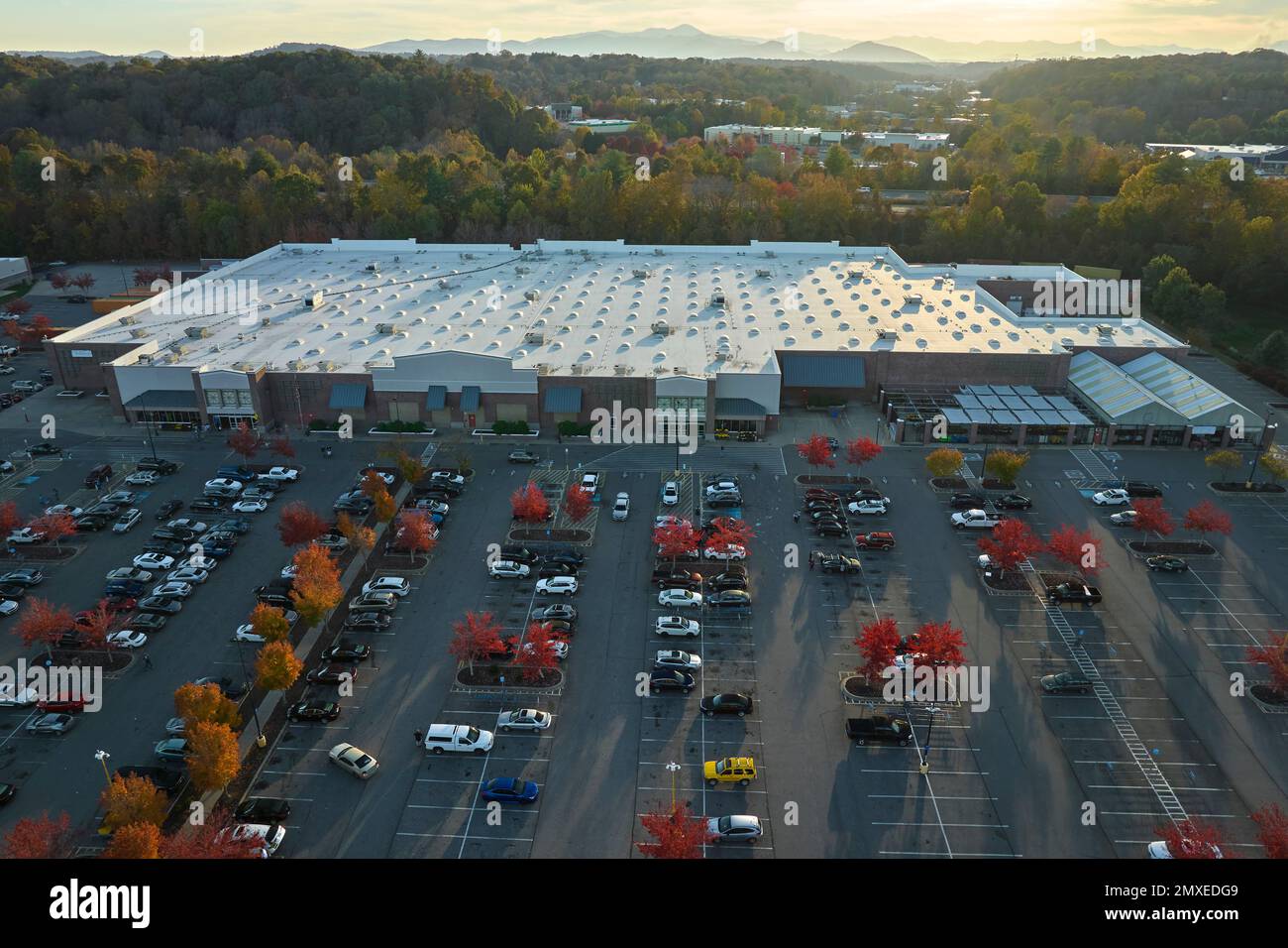 View from above of american grocery store with many parked cars on ...
