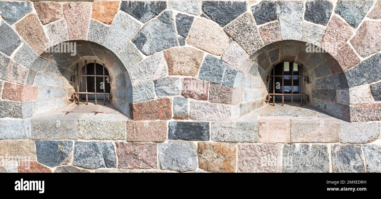 windows with bars in the old stone fortress wall Stock Photo - Alamy