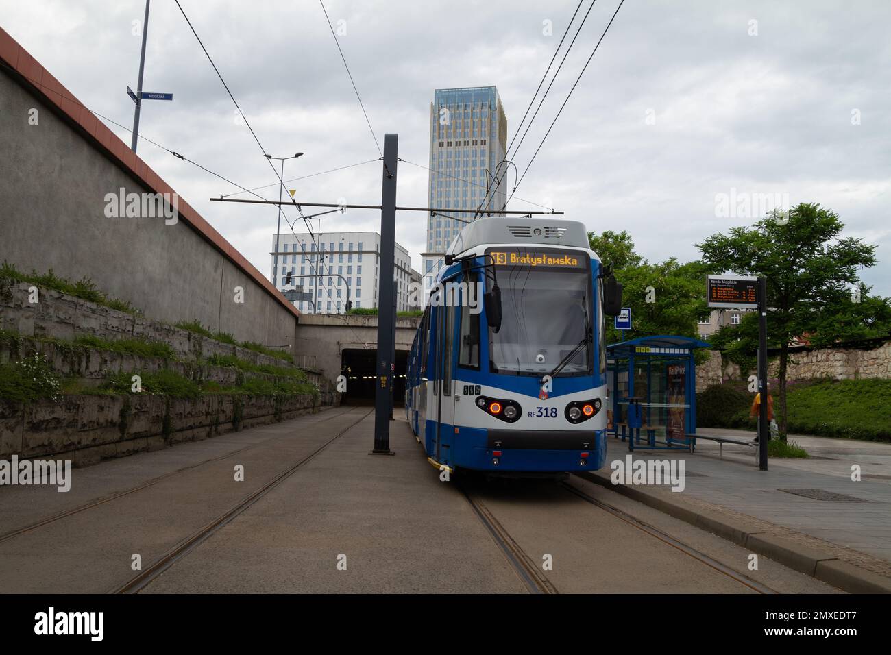 GT8N tramway wagon at Rondo Mogilskie Roundabout stop. Unity Centre ...