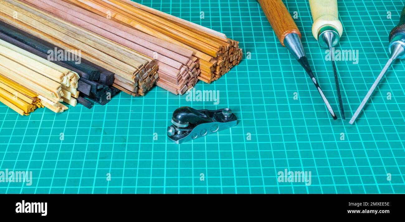 slats of different types of wood and a tool for wooden ship modeling ...