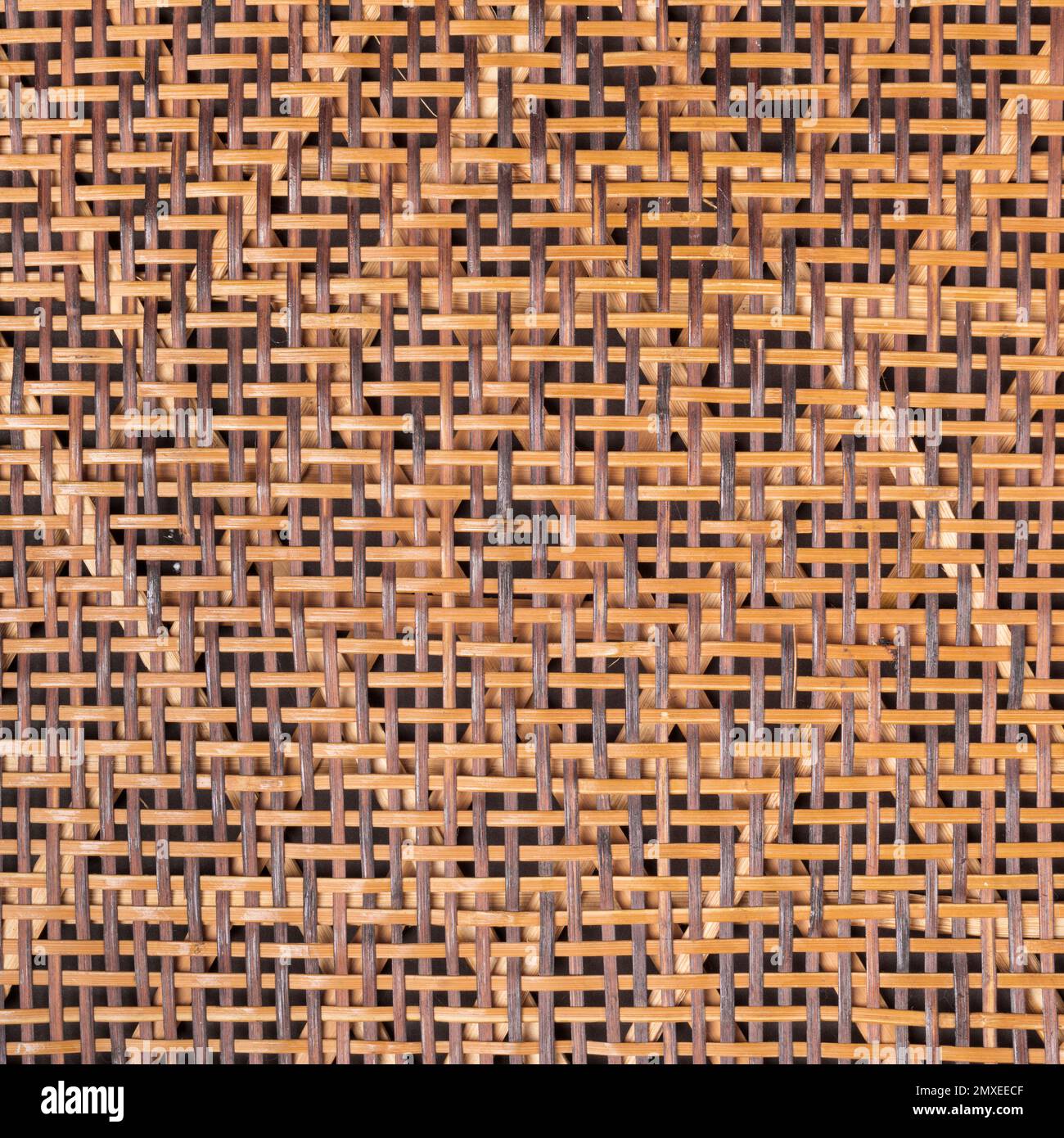 texture of weaving cane stems in orange color Stock Photo - Alamy