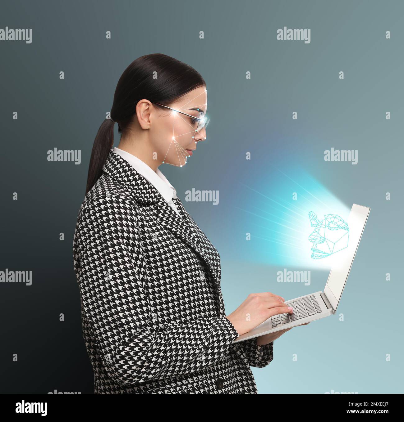 Facial recognition system. Woman using laptop on grey background Stock ...