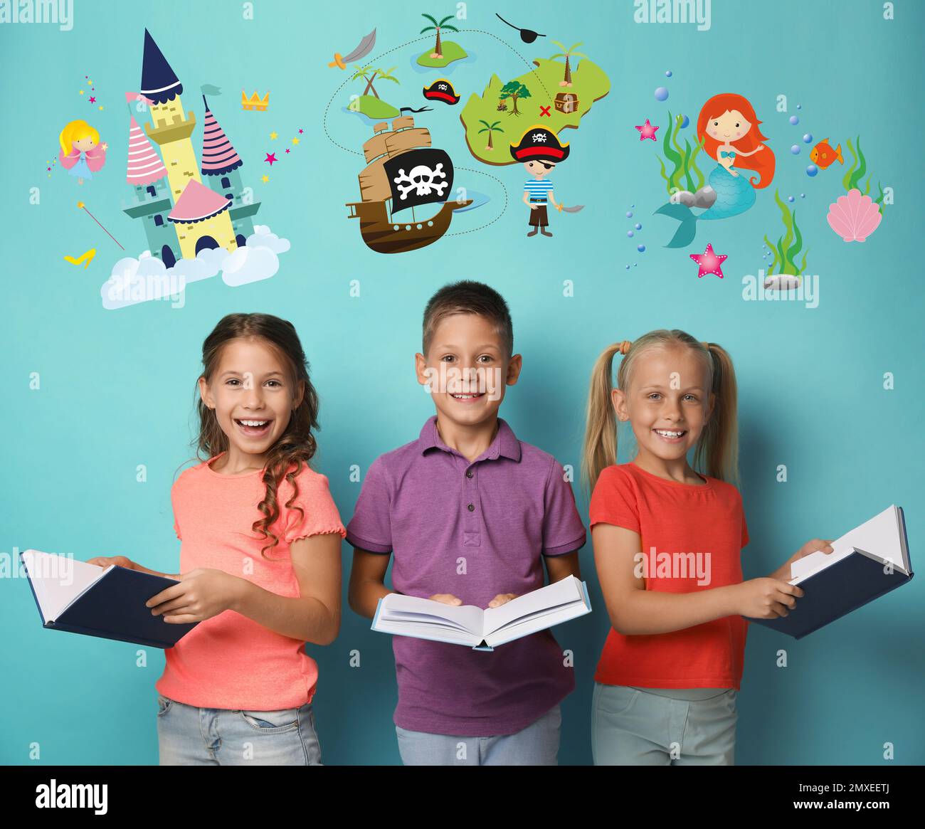 Happy children reading books on light blue background Stock Photo - Alamy
