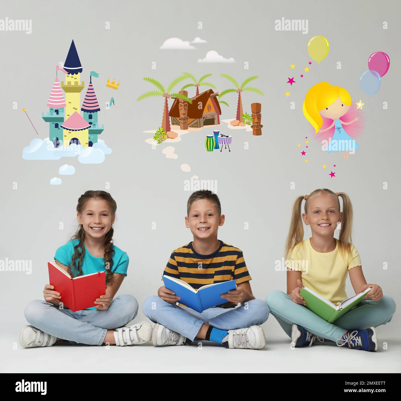 Happy children reading books on grey background Stock Photo - Alamy