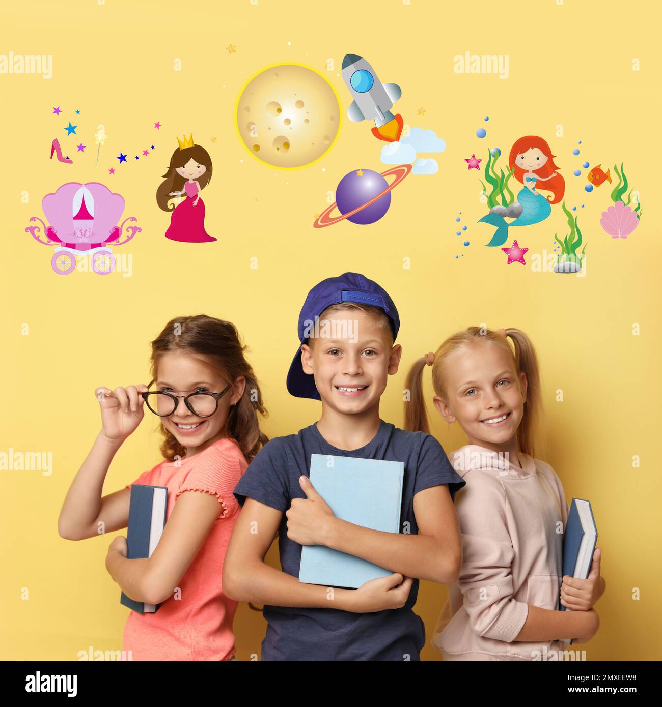 Happy children with books on yellow background. Reading concept Stock ...