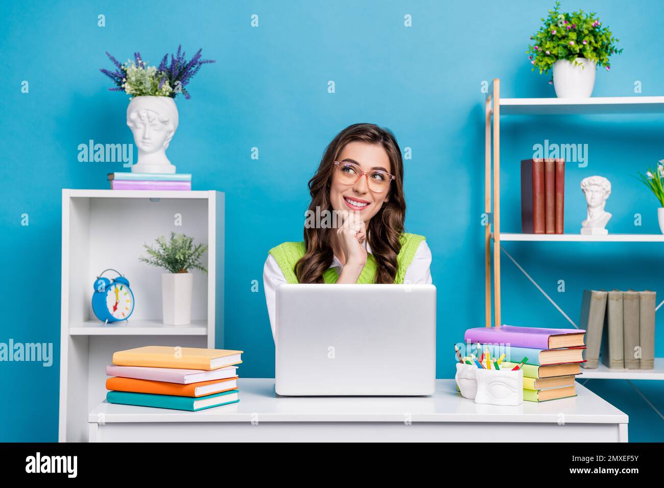Photo of pretty young girl eyeglasses workstation look empty space ...