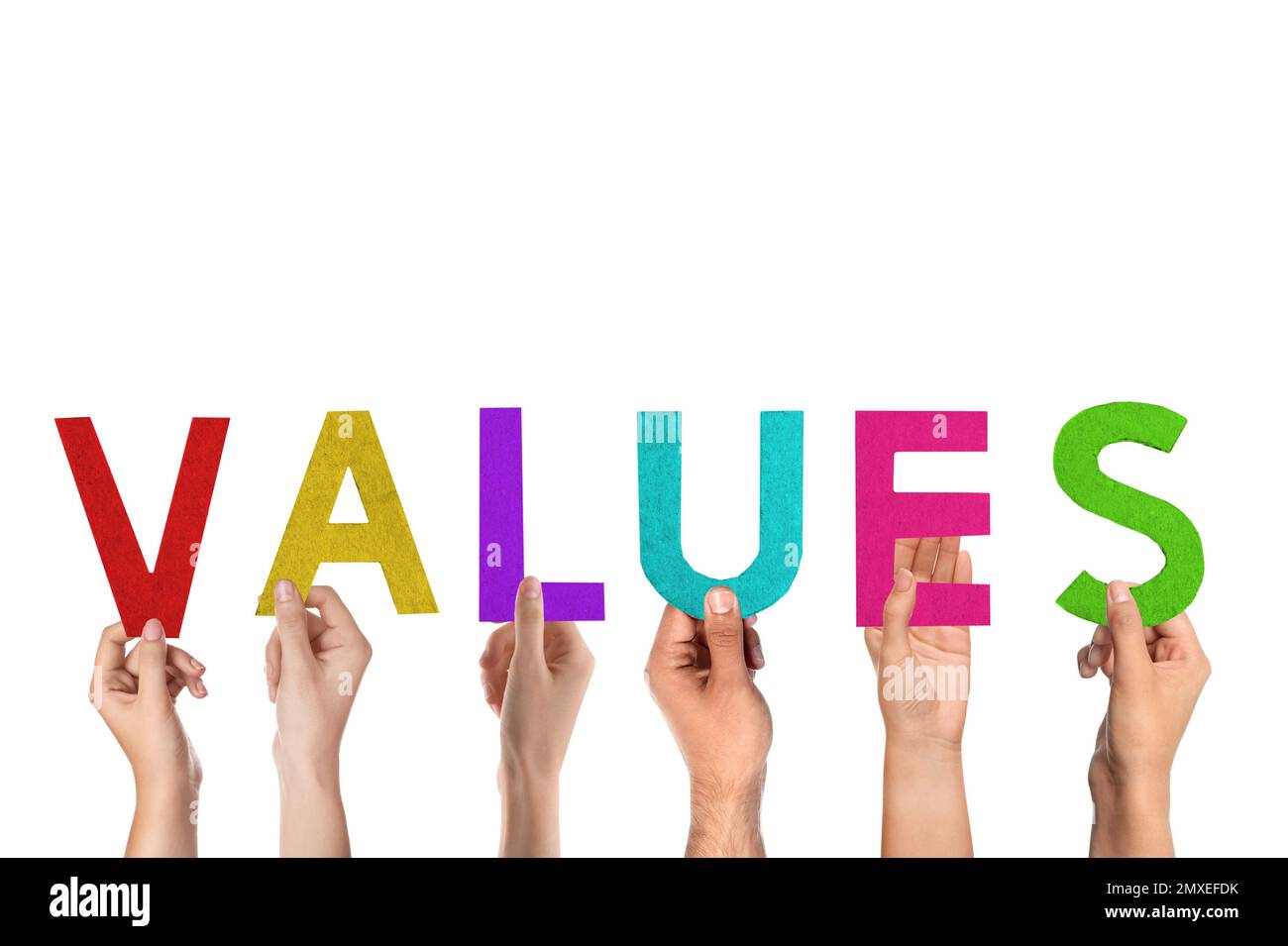 People making word VALUES of letters on white background Stock Photo ...