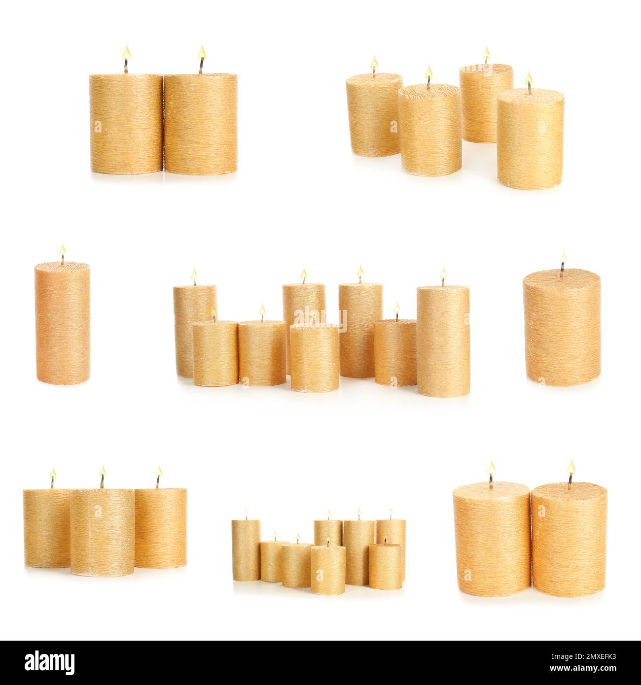 Set of burning gold candles on white background Stock Photo - Alamy