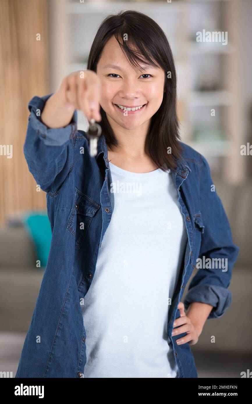 Female throwing keys hi-res stock photography and images - Alamy