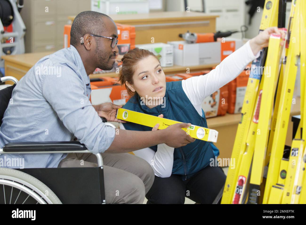 disabled man in a hardware store Stock Photo - Alamy