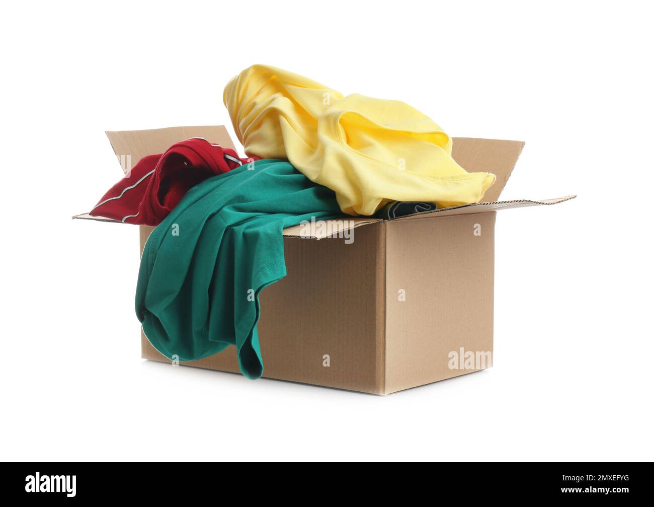 Cardboard box with clothes isolated on white Stock Photo - Alamy