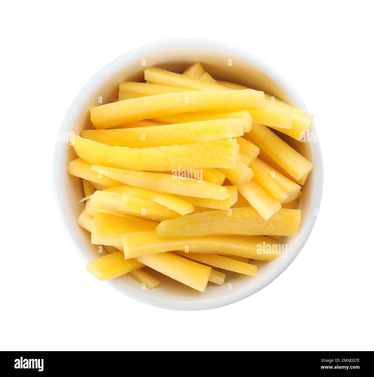 Raw yellow carrot sticks in bowl isolated on white, top view Stock ...