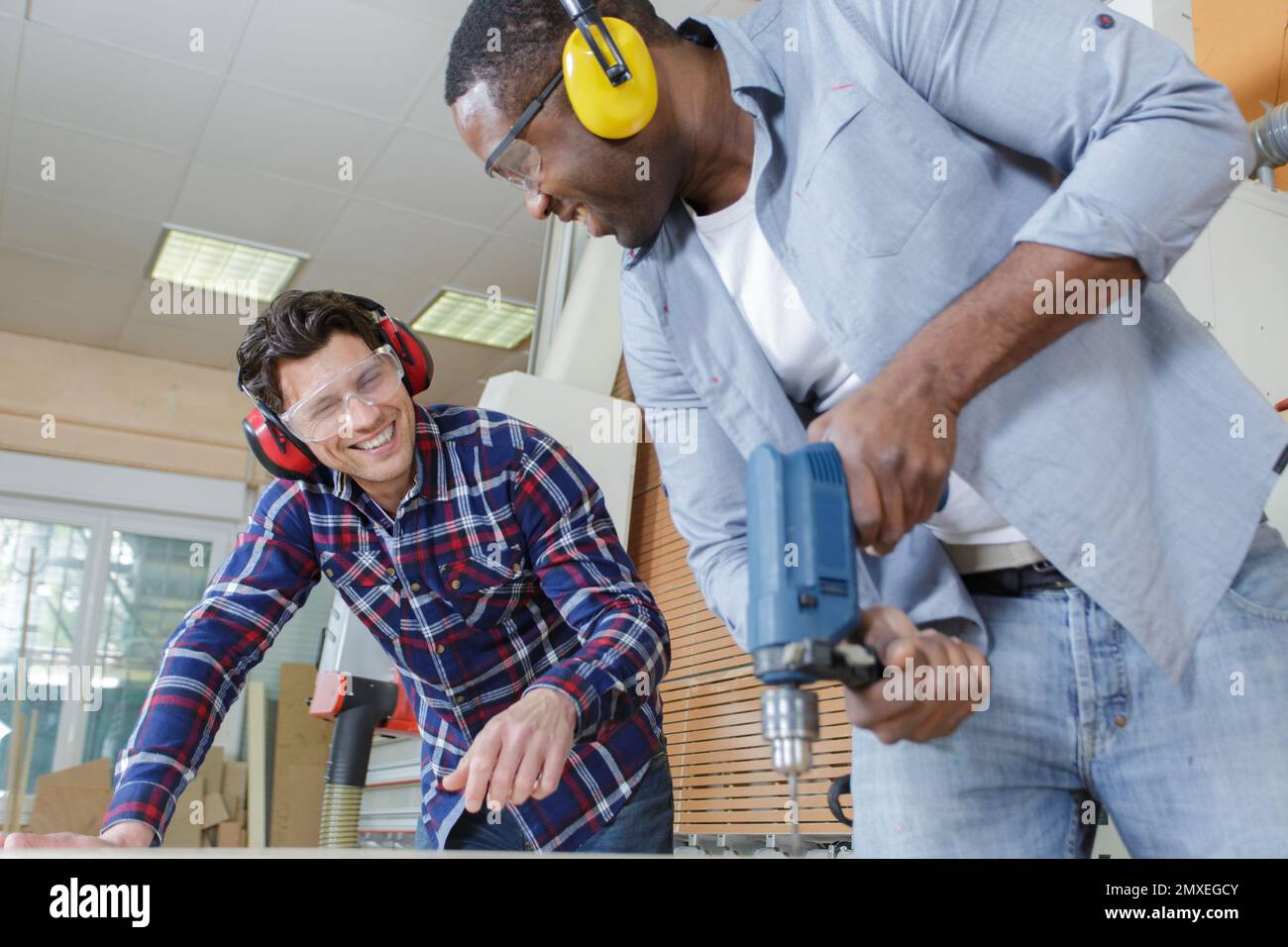Smiling woodworker standing equipment hi-res stock photography and ...