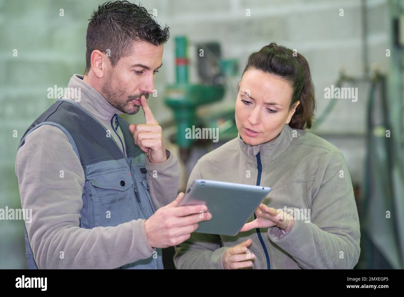 workers are sharing their ideas Stock Photo - Alamy