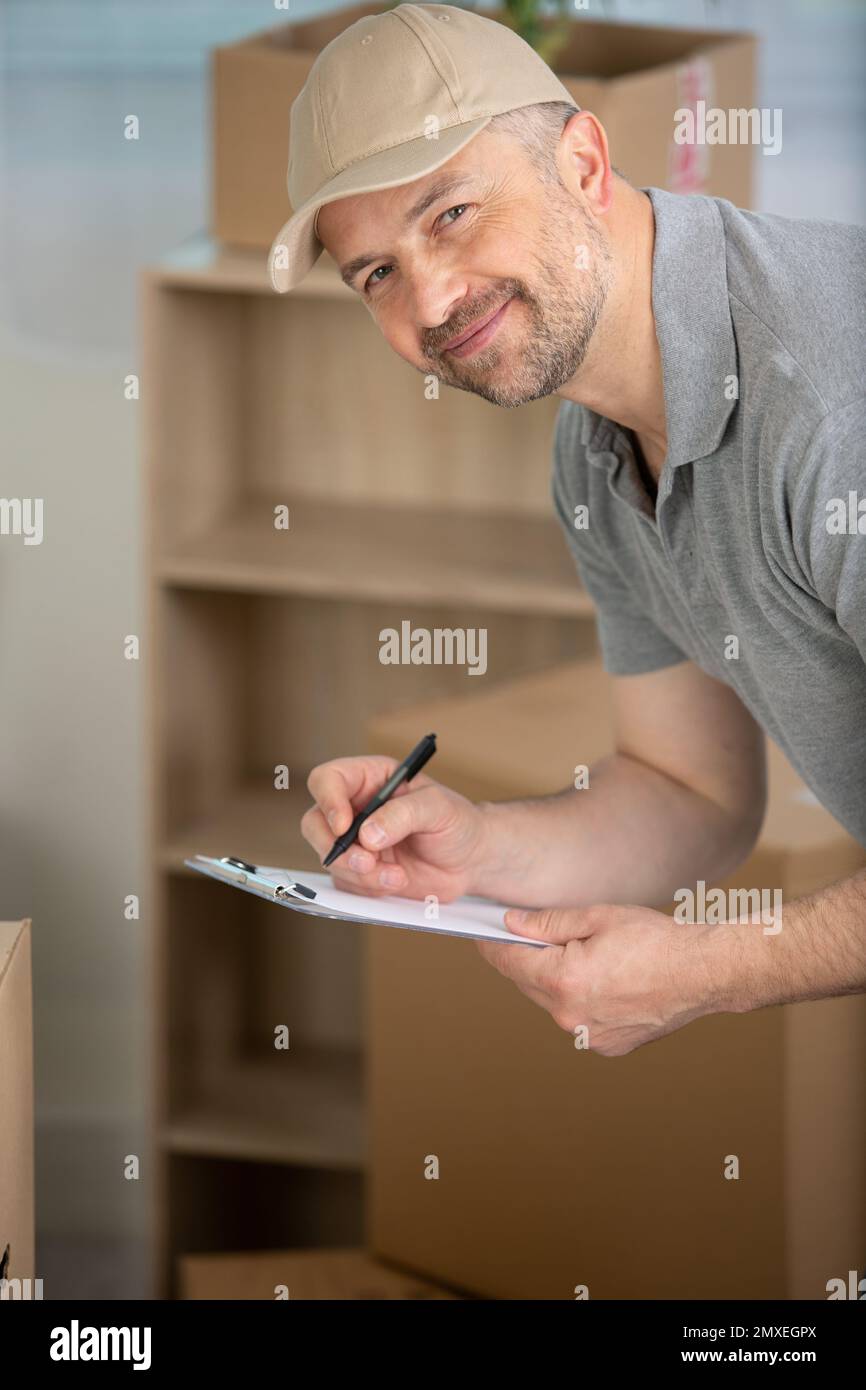 Man checking list in storage hi-res stock photography and images - Alamy