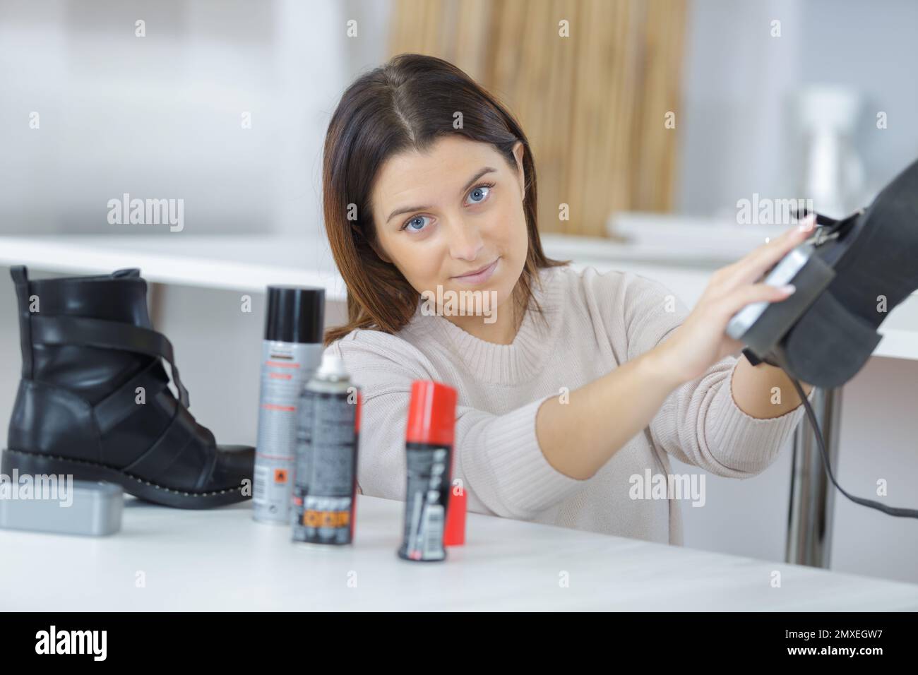 Close up woman cleaning shoes hi-res stock photography and images - Alamy