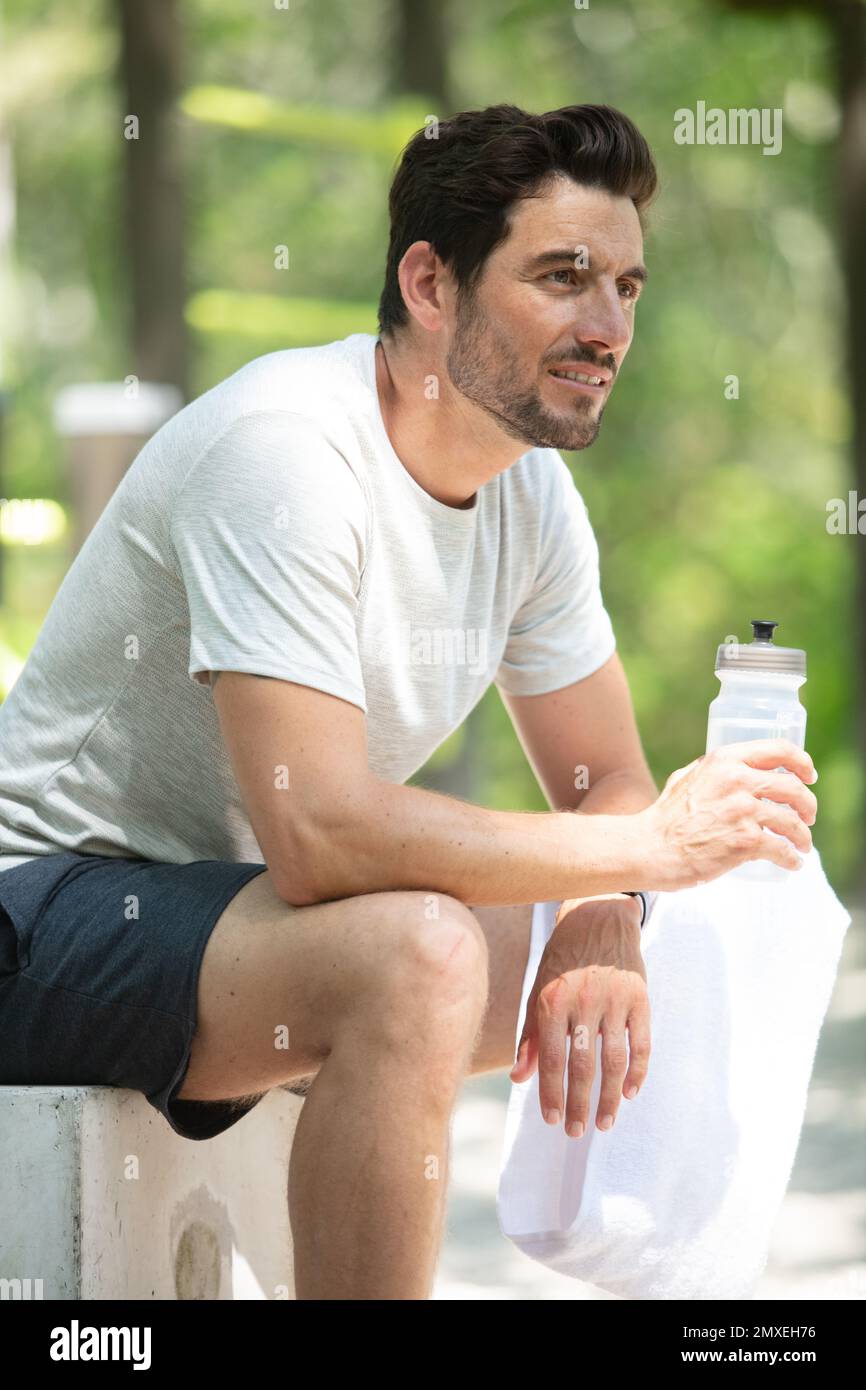 Man cooling off water running hi-res stock photography and images - Alamy