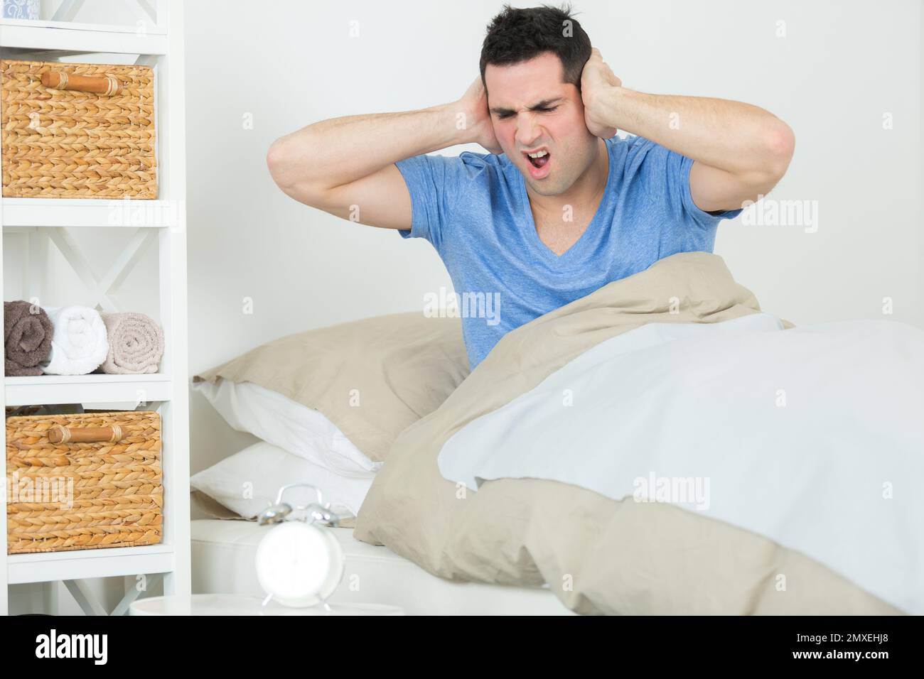tired man in the bed Stock Photo - Alamy