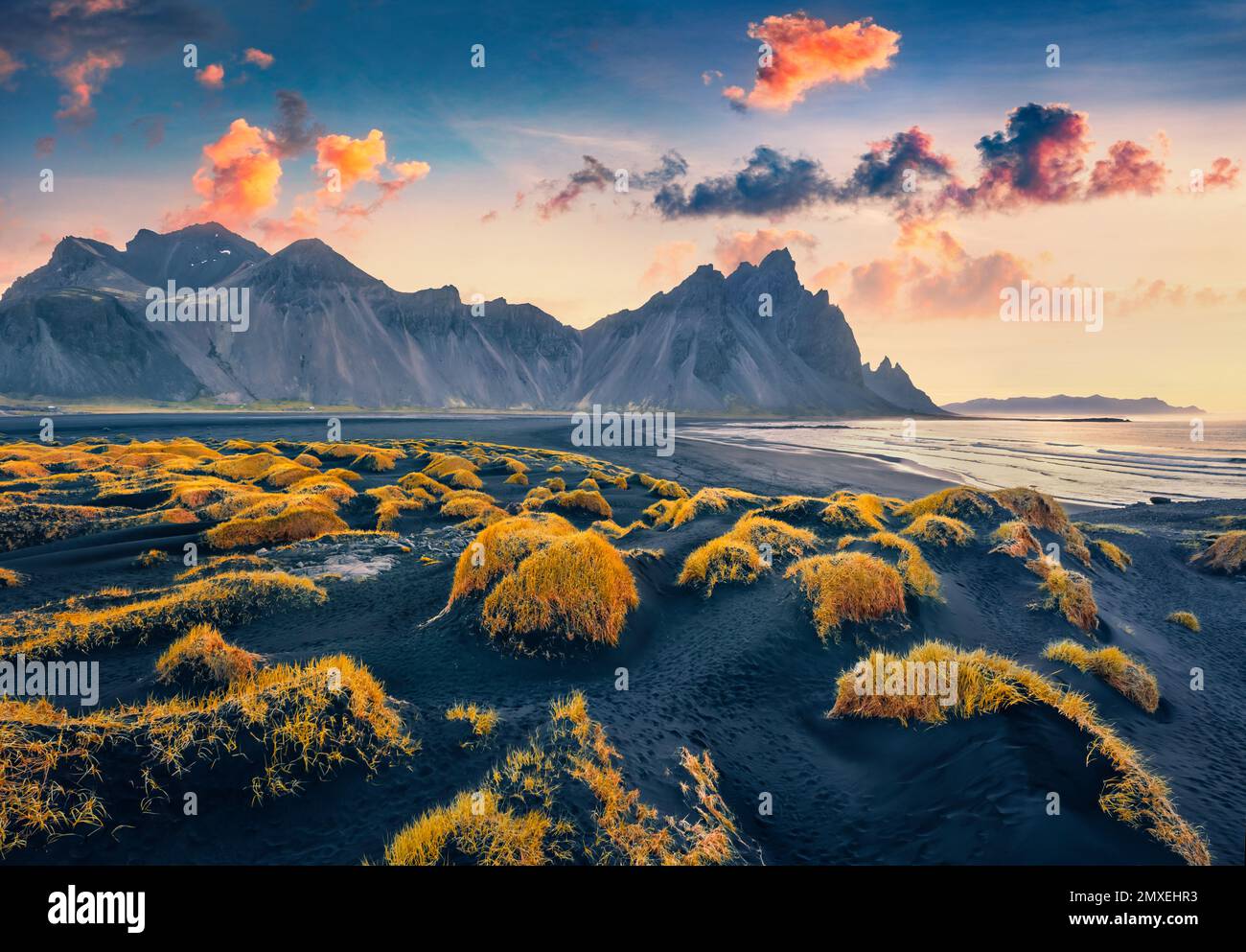 Beautiful autumn scenery. Amazing view from flying drone of black sand ...