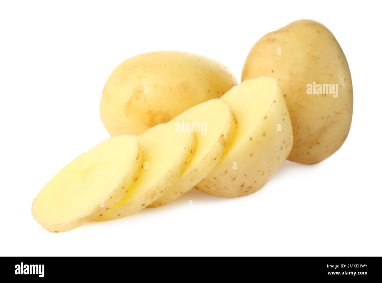 Whole and cut fresh raw organic potatoes on white background Stock ...