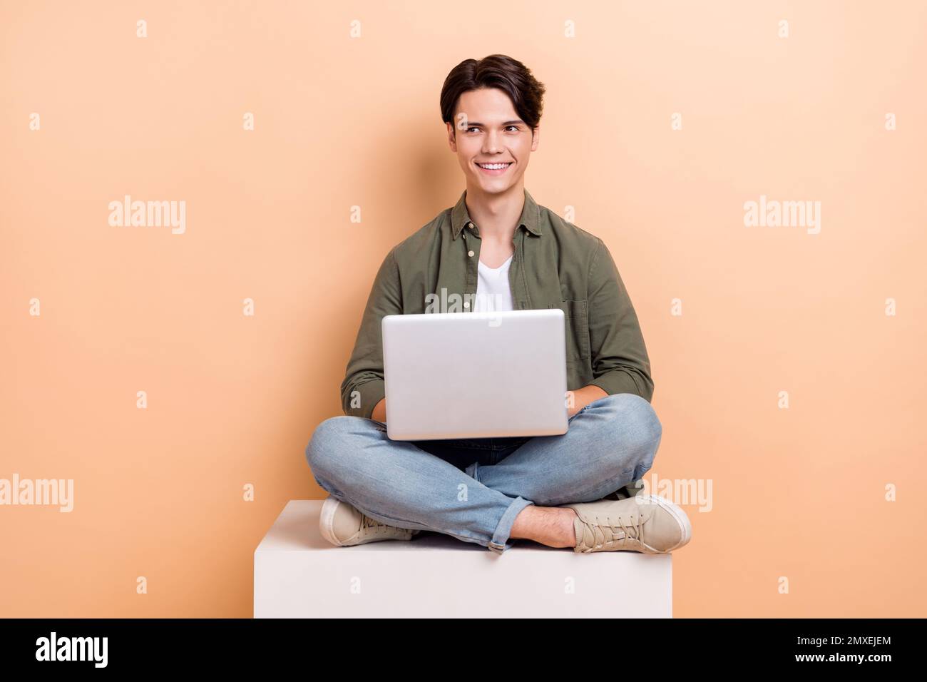 Full body length size photo sitting platform laptop chatting online ...