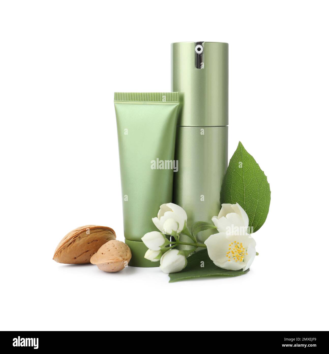 Cosmetic products, almond nuts and flowers on white background Stock ...