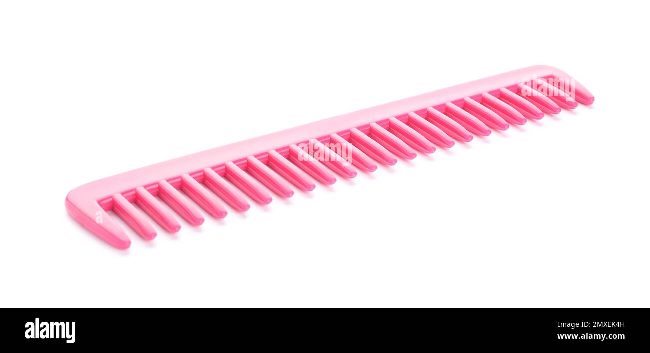 New pink hair comb isolated on white Stock Photo - Alamy