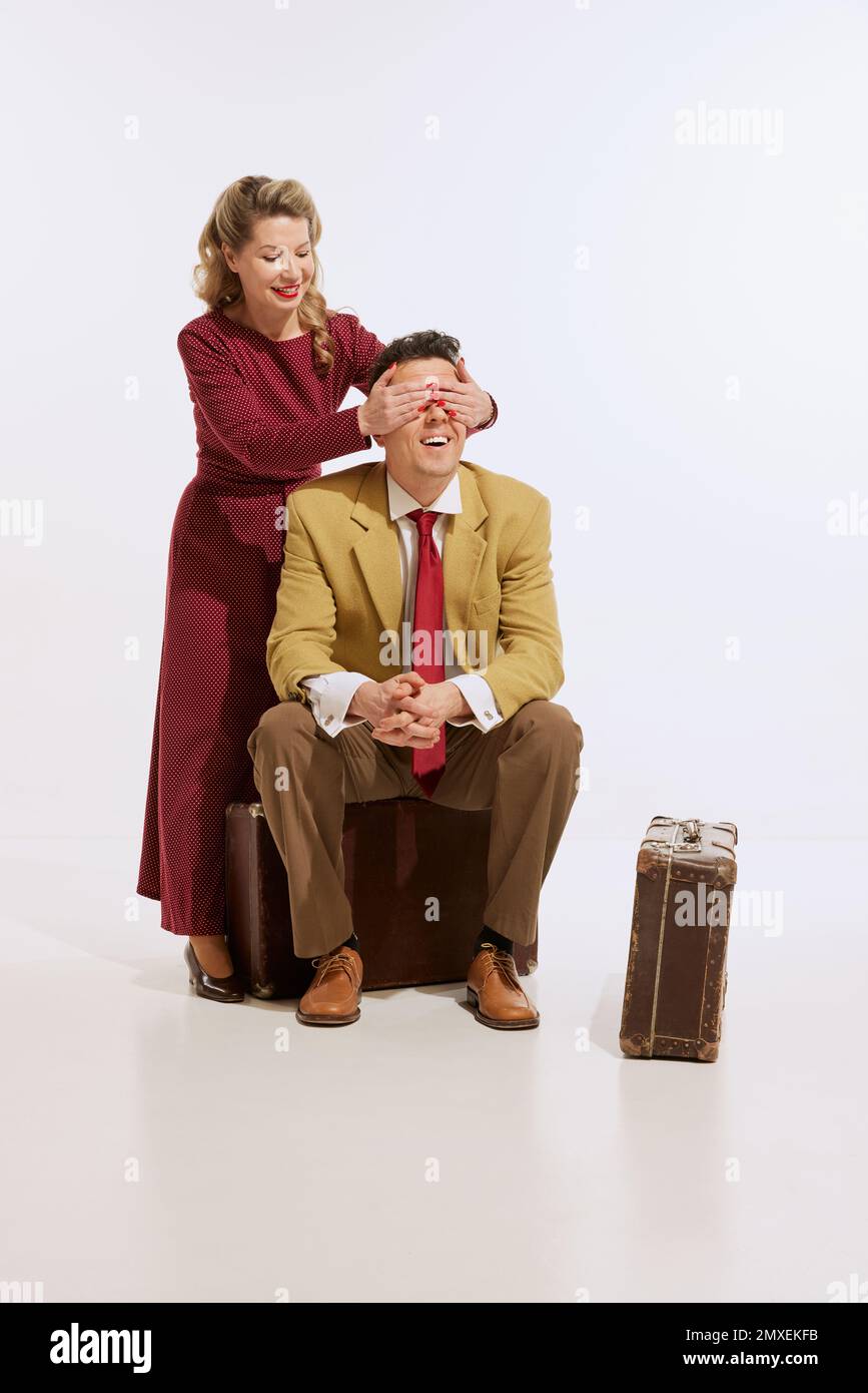 Young man and woman, family couple in retro style clothes isolated over ...