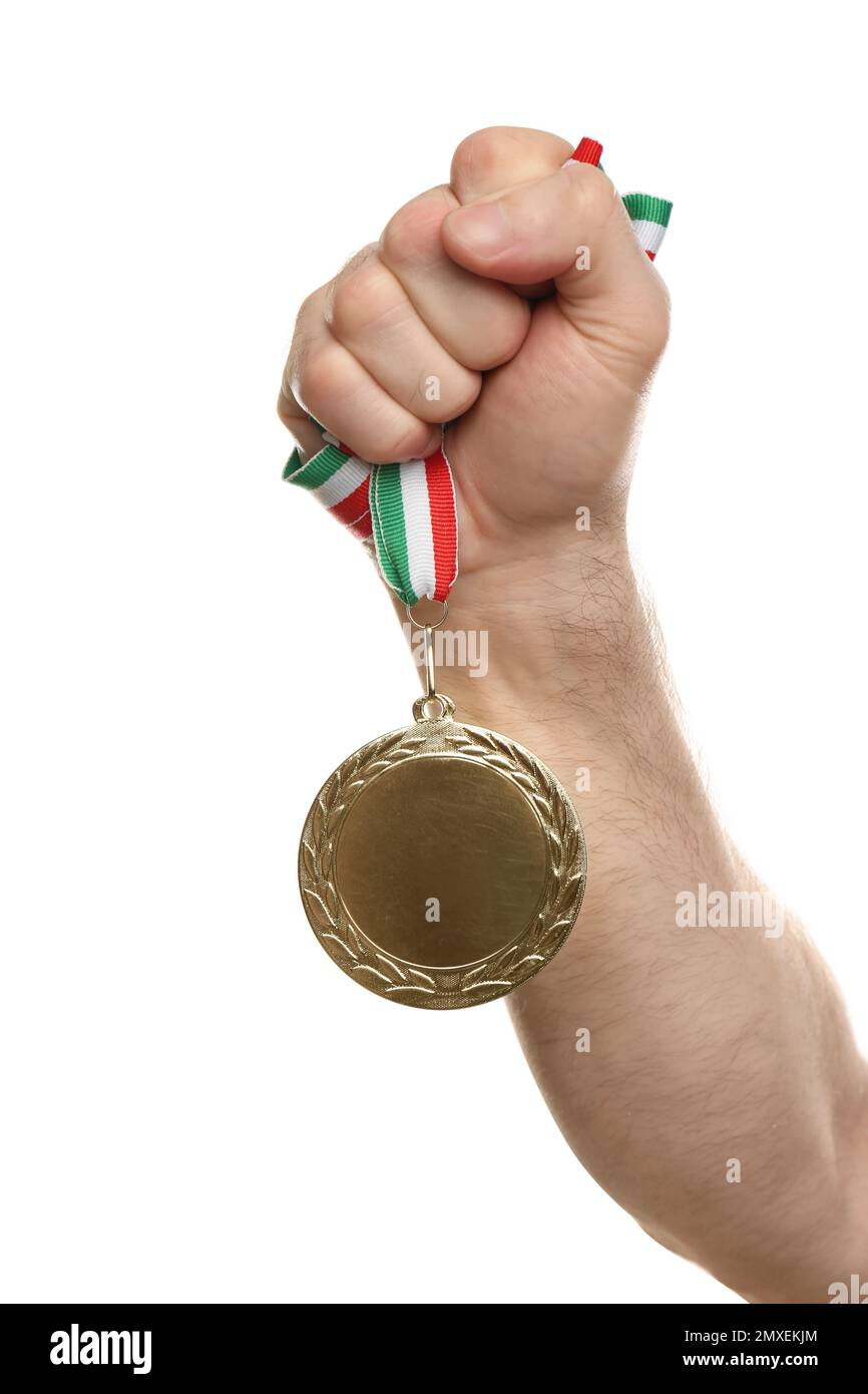 Man holding golden medal on white background, closeup. Space for design ...