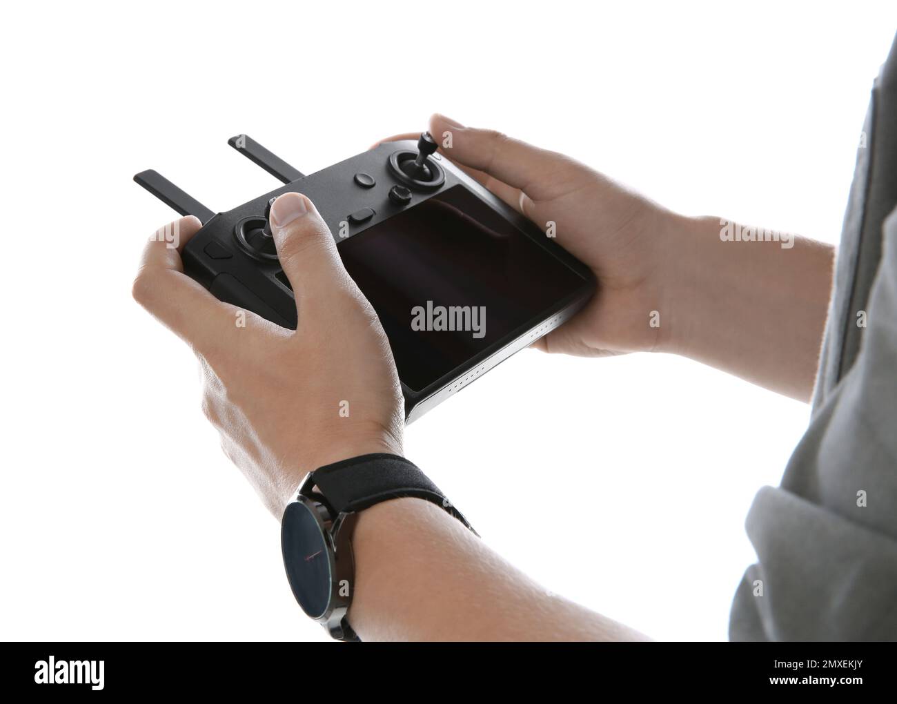 Man holding new modern drone controller on white background, closeup of ...