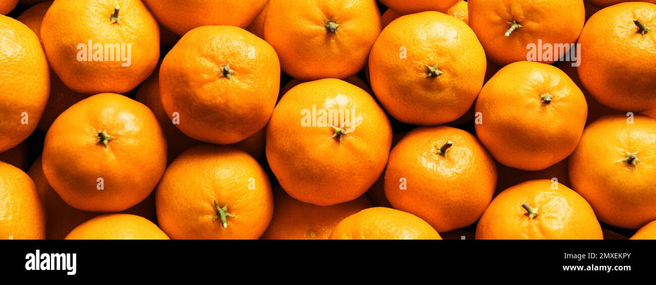 Delicious fresh ripe tangerines as background, top view. Banner design ...