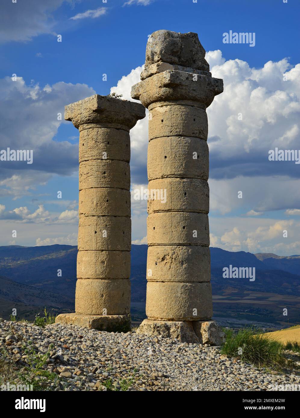 A vertical shot of two historical columns in Karakus Tumulus in Turkey ...