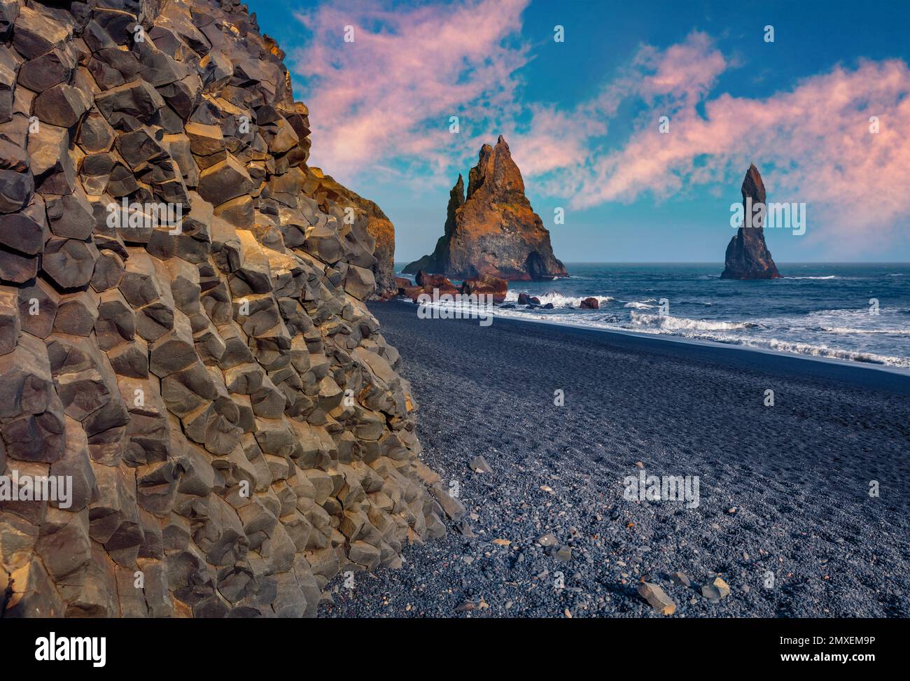 Frozen basalt hexagonal columns on the Atlantic coast. Black sand beach ...