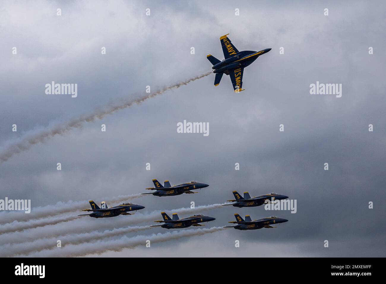 The Blue Angels formation planes flying over Houston against a cloudy ...