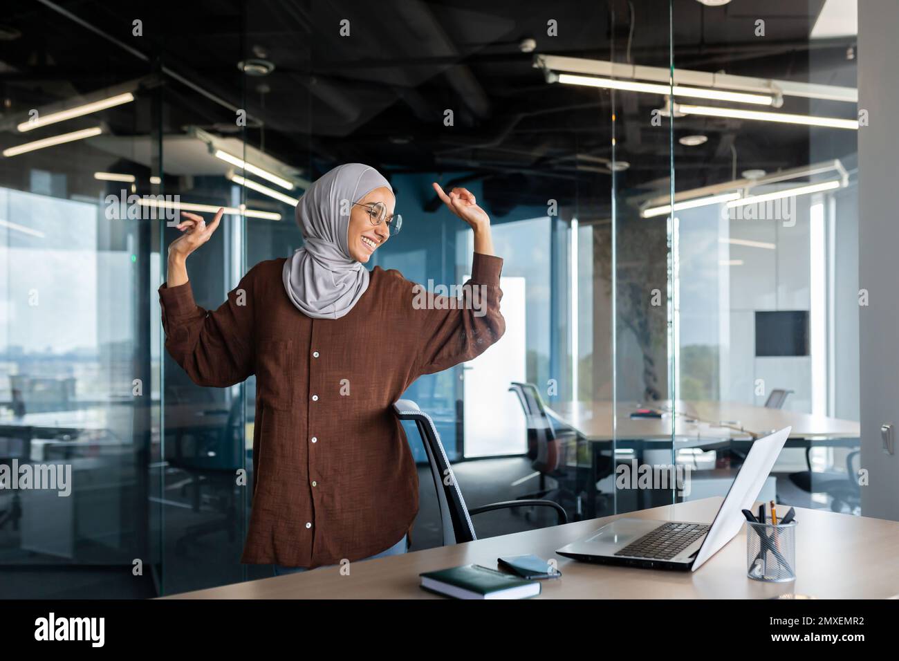 Joyful office worker dancing having hi-res stock photography and images ...