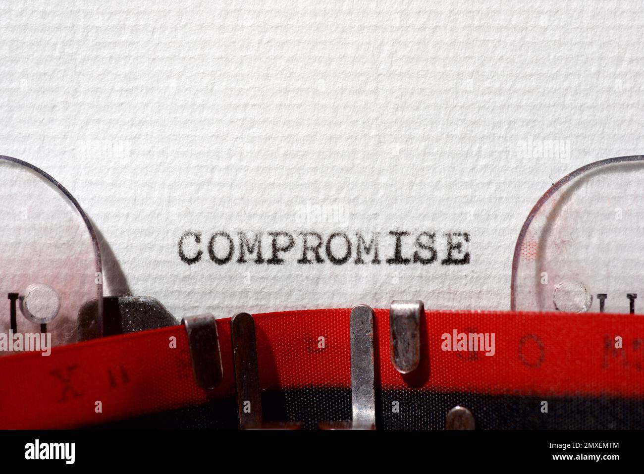 Compromise word written with a typewriter Stock Photo - Alamy