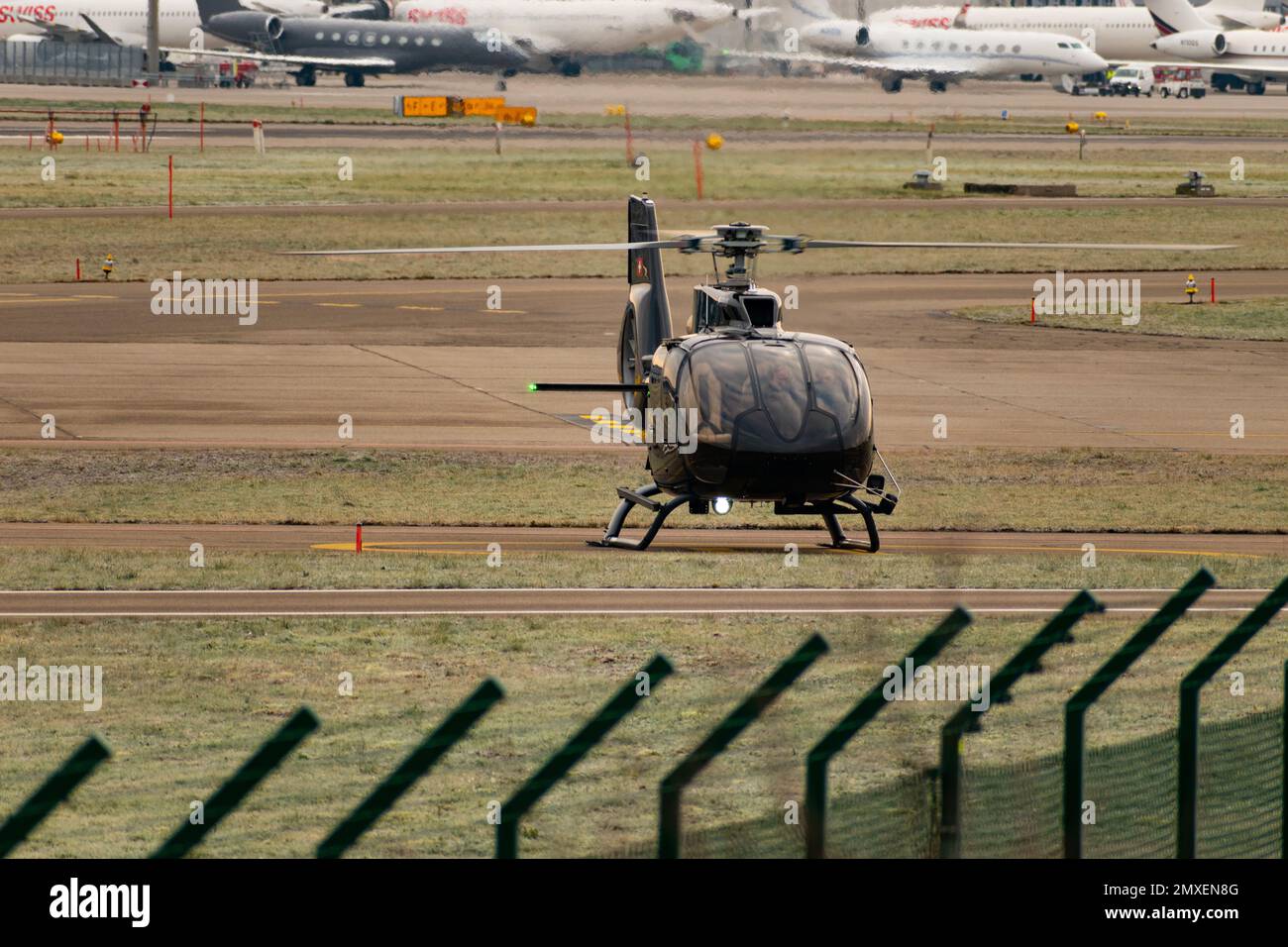 Zurich, Switzerland, January 20, 2023 Unknown helicopter on the apron ...