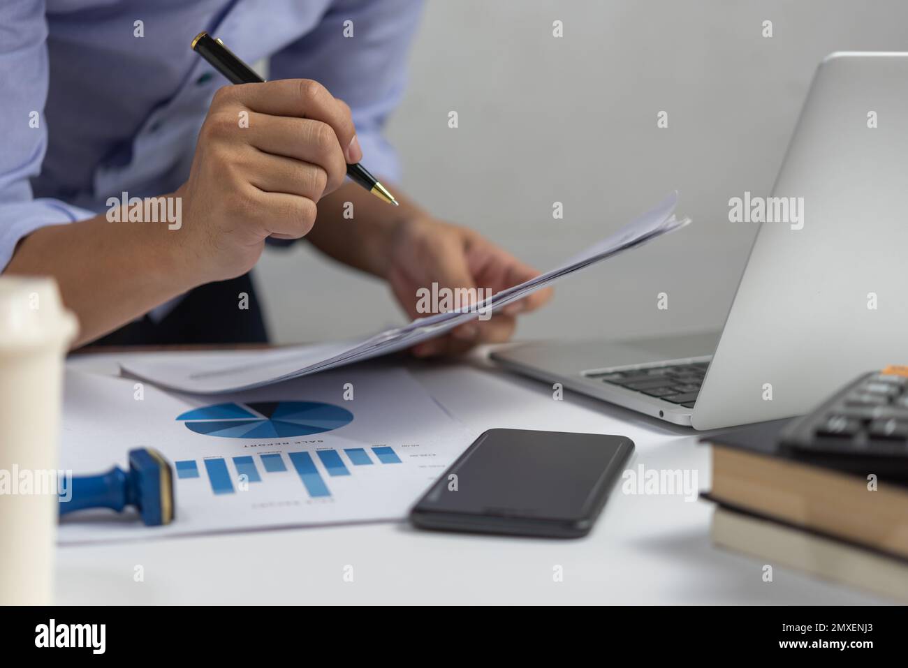 Business person accountant working audit and expense financial report ...