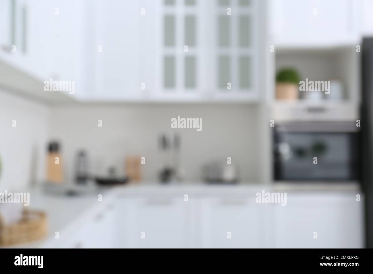 Blurred view of modern stylish kitchen interior Stock Photo - Alamy