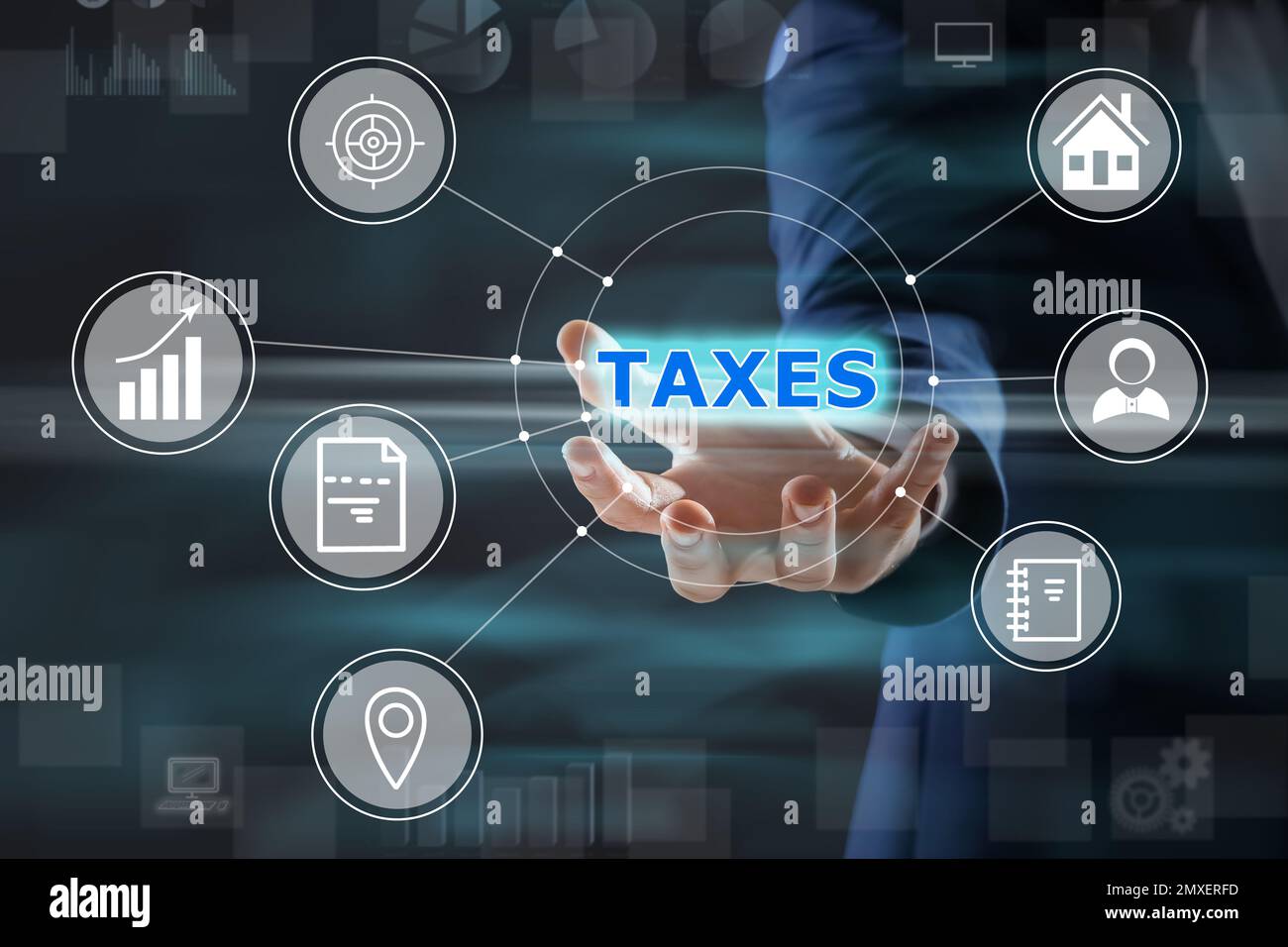 Tax concept. Man demonstrating scheme with icons Stock Photo - Alamy