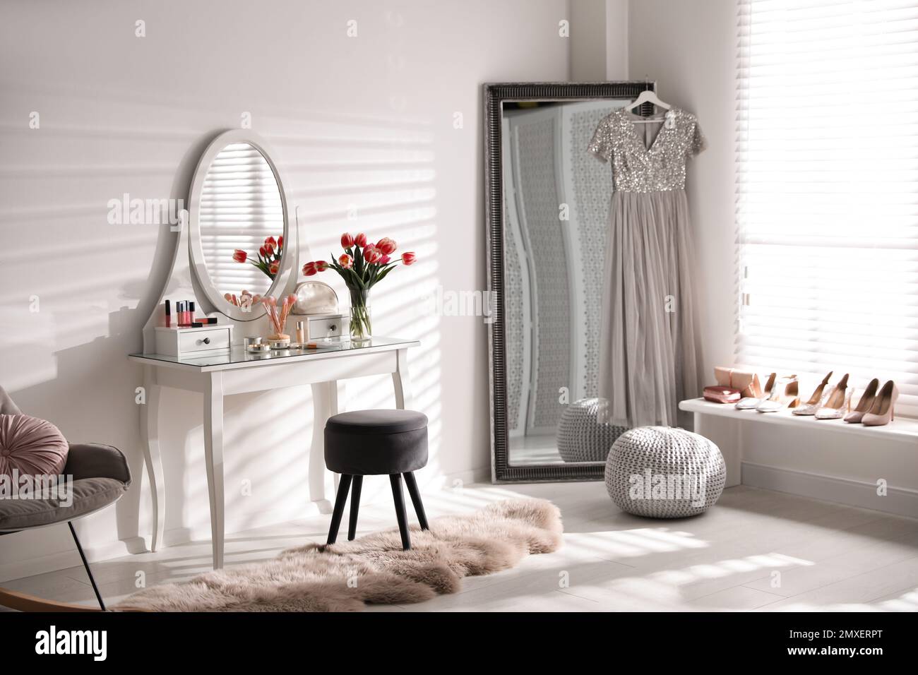 Stylish room interior with elegant dressing table and mirror Stock ...