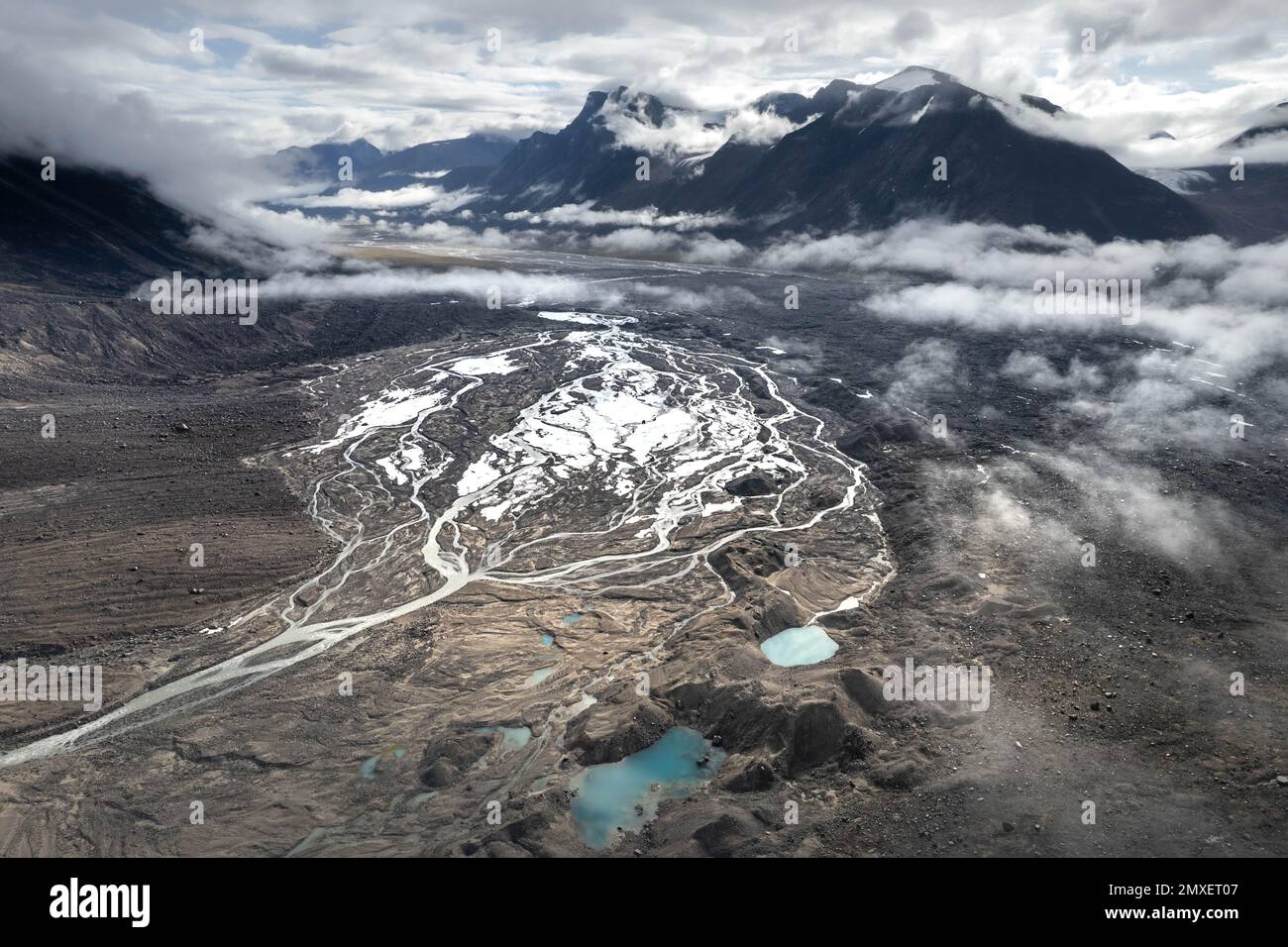The tongue of Tupermit Glacier in Akshayuk Pass. Auyuittuq National ...